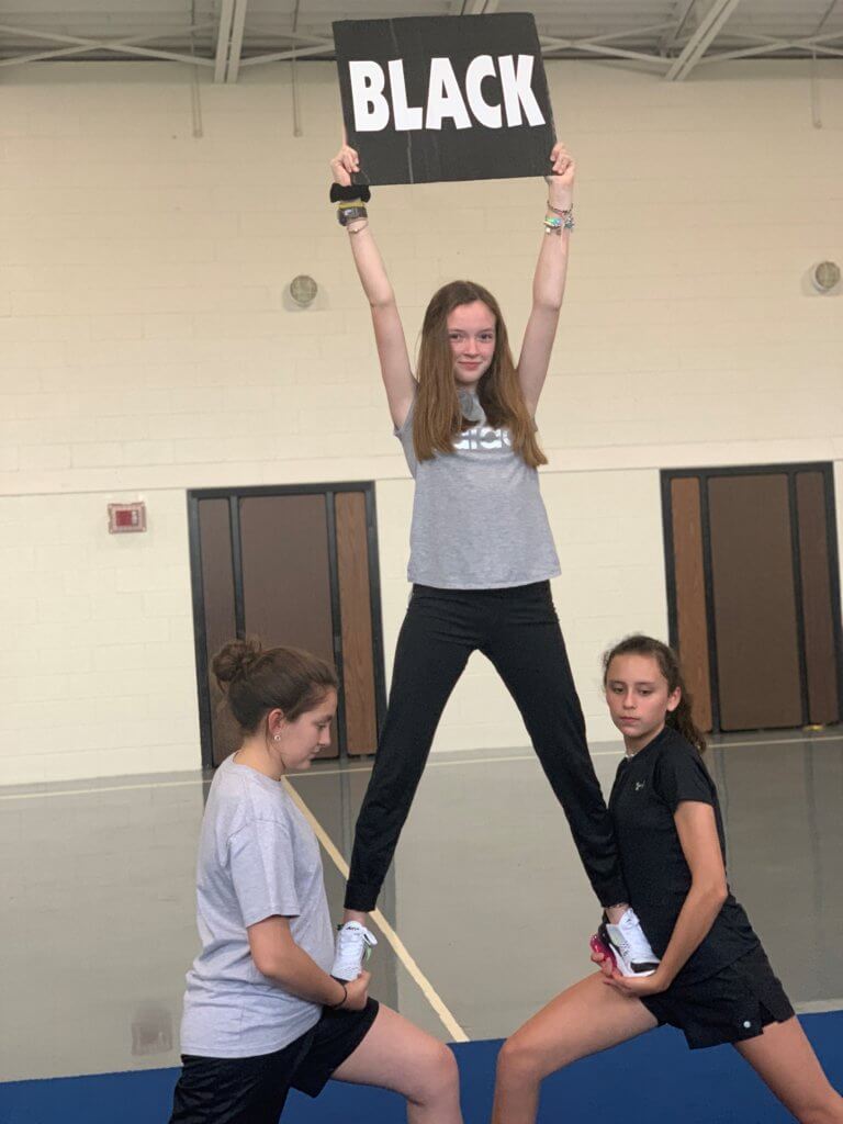 EA Cheer Ready for CYO Football - Everest Collegiate High School & Academy